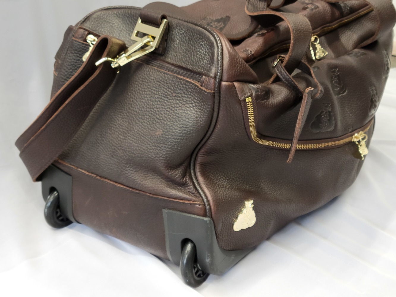 Gene Simmons Money Bags Leather Rolling Duffel Bag with Strap | Avenue ...