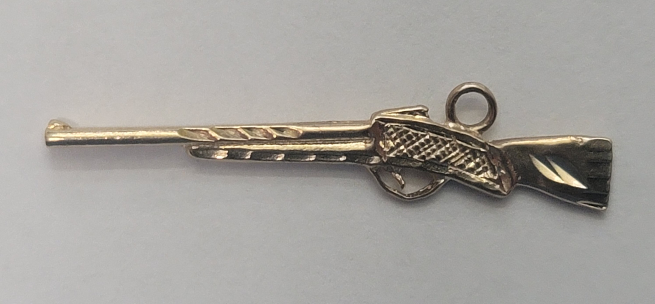 10 Karat Yellow Gold Rifle Charm Pendant | Avenue Shop Swap & Sell